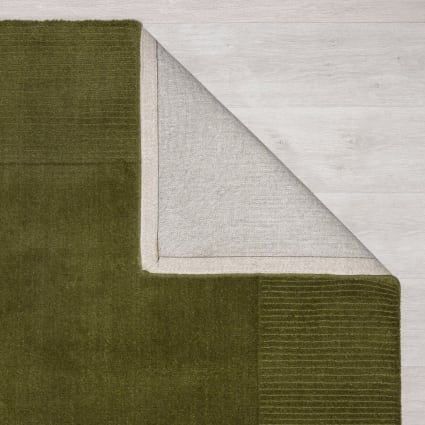 Tapis de salon uni en laine vert 200x290 cm Leone | Maisons du Monde