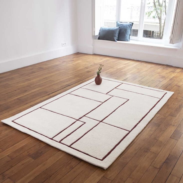 Tappeto in lana intrecciata a mano con motivi | Maisons du Monde